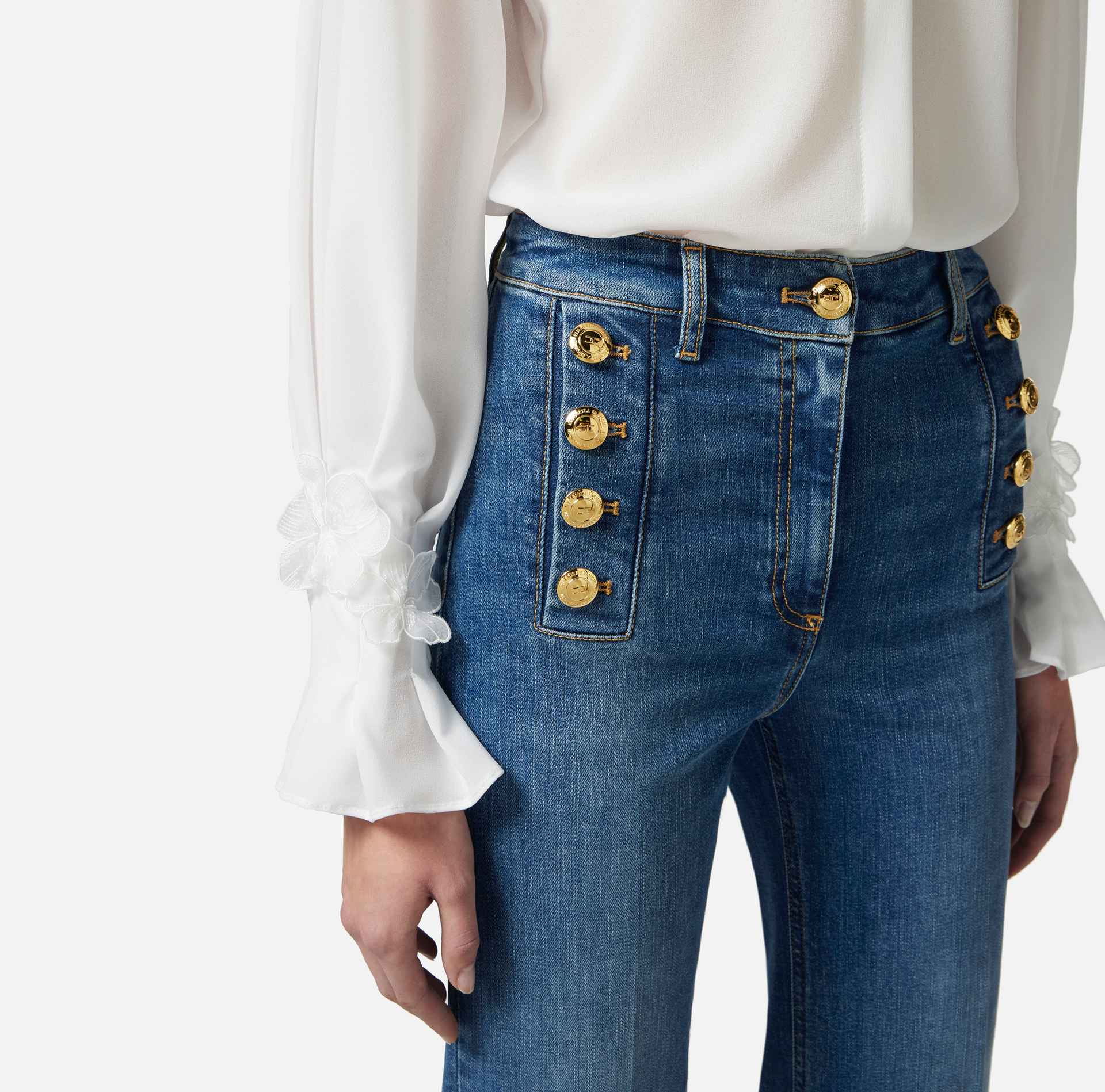 Bell-bottom jeans with row of buttons | Elisabetta Franchi® Outlet